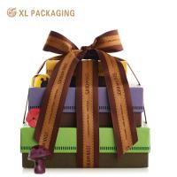 China Custom Soft Touch Rigid 9pcs Eco-friendly Chocolate Gift Box with Ribbon for Holiday Packaging for sale