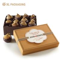 China Luxury Textured Paper Chocolate Gift Box with Embossed Logo Elastic Tag and Easy Open Lid for sale