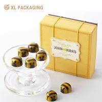 China Luxury Textured Paper Chocolate Gift Box with Embossed Logo Elastic Tag and Easy Open Lid for sale