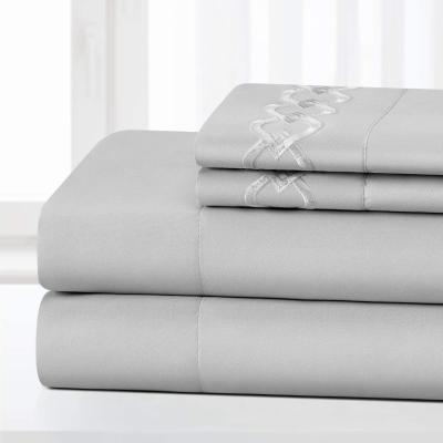China 90gsm Embroidered Sheets Set Solid Pattern Extra Soft Wrinkle and Fade Resistant 4PCS for sale