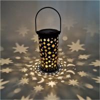 China Iron Hollow Solar Lanterns For Outside Star Moon Retro Light Terrace Path Decoration IP66 for sale