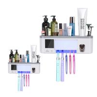 China ABS Uv Toothbrush Sanitizer Holder Toothpaste Dispenser Multifunctional Storage Rack USB Charging for sale