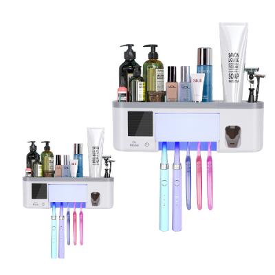 China ABS Uv Toothbrush Sanitizer Holder Toothpaste Dispenser Multifunctional Storage Rack USB Charging for sale