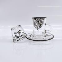 China Elegant Glass Tea Cups made from durable heat resistant glass ideal for serving vibrant flower teas coffee and espresso in hospitality settings for sale