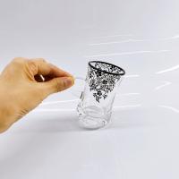 China Transparent Glass Tea Cups featuring elegant floral design ideal for showcasing beverage colors during tea parties or daily for sale