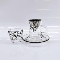China Elegant Glass Tea Cups made from durable heat resistant glass ideal for serving vibrant flower teas coffee and espresso in hospitality settings for sale