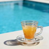 China Glass Cup Sets 12 Piece Wavy Patterned Cups and Saucers with Ergonomic Handles Durable Design for Cafes Homes and Special Occasions for sale