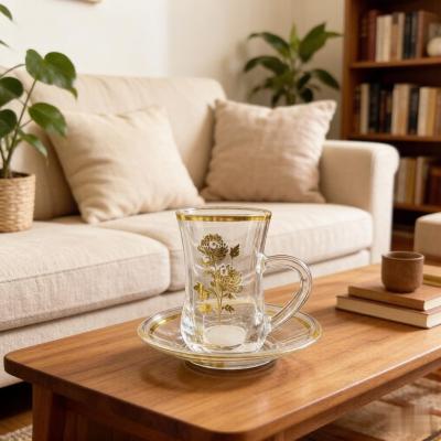 China Top Mouth Diameter 54MM Clear Glass Tea Cup Set 6pcs Turkish Cups 6pcs Saucers Featuring Artistic Decal And Pearl Decoration Ideal For Tea Presentation for sale