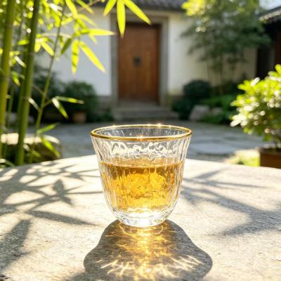 China Delicate Vintage Hammered Glass Cawa Cup with Golden Rim Clear Lead-Free Glass Teacup for Beverage for sale