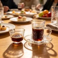 China 36PCS Embossed Gold Rim Glass Tea Cup Set Handle Glass Coffee Cup Cawa Cup with Saucer Factory Wholesale Arabic Tea Glassware for sale