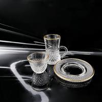 China Elegant Gold Rim Embossed Glass Tea Cup with Saucer Arabic Turkish Style Glass Tea Cup Premium Quality Luxury Glassware for Tea & Coffee for sale