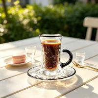 China 12PCS Elegant Wavy Textured Glass Coffee Cup & Saucer Set Black Painted Handle Glassware for Daily Home & Outdoor Patio Use for sale