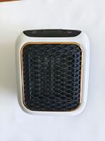 China Wall-Outlet Space Heater 230V Compact Warm Air Fan Heater Portable Heater 1200W European Version Plug for sale