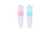 China Baby silicone rice cereal spoon milk bottle squeeze feeding spoon child silicone feeding bottle with spoon for baby for sale