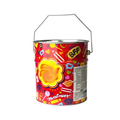 China Custom Cylindrical Tinplate Candy Jar Cartoon Design Handle Suitable Milk Flavor Hard Candy Tasty Lollipop Storage for sale