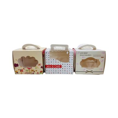 China Custom Food Packaging Box With Handle With Window Transparent Cake Box Cake Boxes Packaging Wholesale Custom for sale