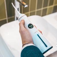China DIY 5 Mode Portable Electric Water Flosser 300ML Cordless Dental Care for Adults for sale