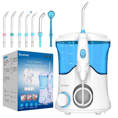 China 600ml Teeth Whitening Oral Irrigator Combo Electric Toothbrush IPX4 Countertop Water Flosser for sale