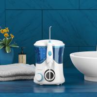 China 600ml Teeth Whitening Oral Irrigator Combo Electric Toothbrush IPX4 Countertop Water Flosser for sale