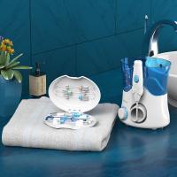 China 600ml Teeth Whitening Oral Irrigator Combo Electric Toothbrush IPX4 Countertop Water Flosser for sale