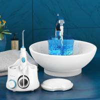 China 600ml Teeth Whitening Oral Irrigator Combo Electric Toothbrush IPX4 Countertop Water Flosser for sale