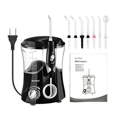 China 600ml Teeth Whitening Oral Irrigator Combo Electric Toothbrush IPX4 Water Flosser Countertop for sale