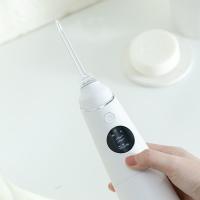 China Cordless 100ml Electric Water Flosser Portable 200g Dental Oral Irrigator with Magnetic Charging for sale