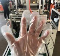 China ZX company high-speed PE plastic glove production line 	warranty service for sale