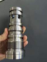 China Custom Machined Parts Manufacturer 40Cr 42CrMo Alloy Steel Hydraulic Cartridge Valve Sleeve with Multi-Seal Grooves for sale
