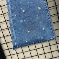 China OEM ODM Women's Stretch Bootcut Jeans , Medium Blue Sand Wash Flared Denim Jeans for sale