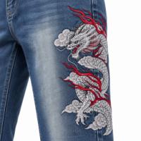 China Relaxed Fit Denim Jeans , Men'S Whiskered Sand Wash Jeans With Heavy Embroidery for sale