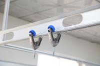 China Vertical Conveyor Logistics SS Clothes Hanging System for sale