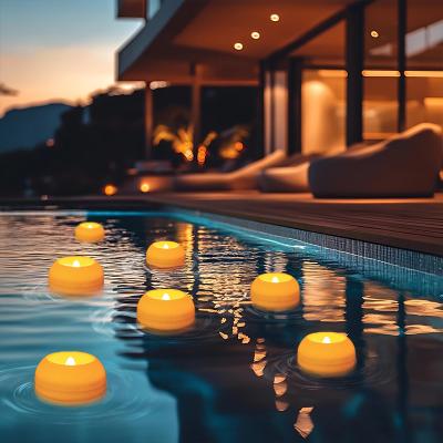 China Customized Waterproof Floating LED Candles 6x3.3cm Plastic Cordless Flickering Tealights for Pool Party Decor for sale