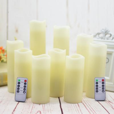 China Set of 24 Ivory White Waterproof Flameless LED Candles with Remote Timer for Outdoor Wedding Festival Decoration for sale
