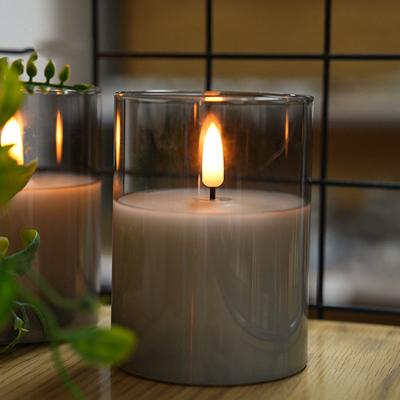 China Customized Flameless LED Candle Paraffin Wax Glass D7.5x10cm 2AA Battery for sale