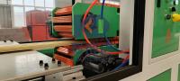China Automatic tube-pulling machine Roller type high-speed drive traction device plastic sheet winding machine for sale