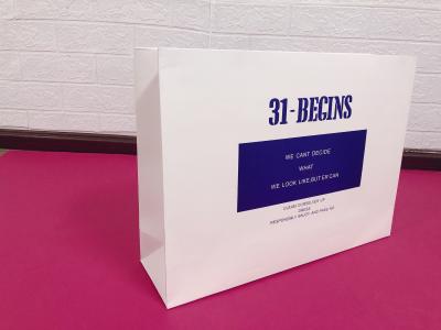 China Custom Logo 200gsm White Card Paper Carrier Bags with Rope Handles for Promotional Shopping for sale