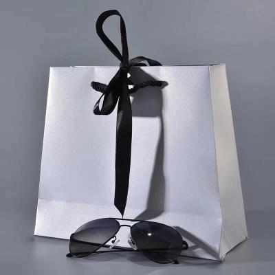 China Custom Matt Laminated Paper Shopping Bags 100g with Grosgrain Ribbon Handle for sale