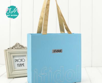 China Custom Printed Kraft Paper Carrier Bags 13x8x15cm with Ribbon Handles Recyclable for sale