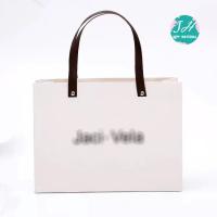 China Custom Printed Paper Shopping Bags 32x11x38cm CMYK Color Luxury Gift Bags with Handles for sale
