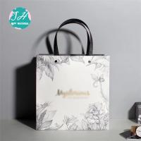 China Custom Printed Paper Shopping Bags 32x11x38cm CMYK Color Luxury Gift Bags with Handles for sale