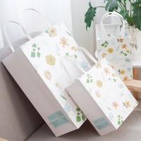 China Custom Kraft Paper Carry Bags 32x11x38cm CMYK Color Luxury Shopping Tote for sale