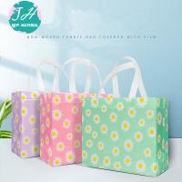 China Custom Gloss Lamination PP Non Woven Bag 15-30 lb Capacity Reusable Shopping Tote for sale