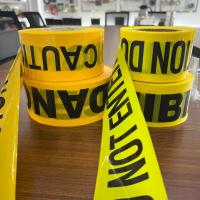 China PE Warning Tape CAUTION Yellow Black Non Adhesive Safety Barrier Tape 75mm x 200m for sale