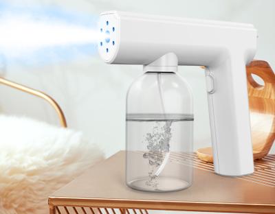 China Handheld Rechargeable Disinfectant Spray Gun 300ML Nano Steam UV Blue Light Sanitizer 2000mAh for sale