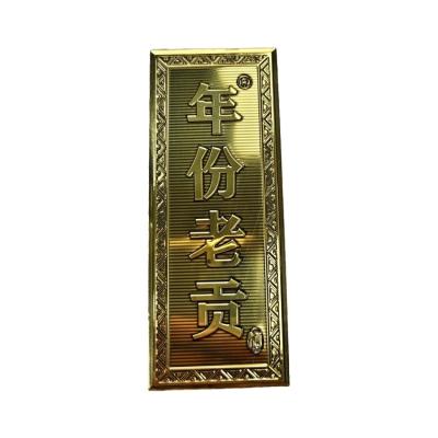 China Vertical Gold Metal Label Retro Texture Embossed Wine Label Customized for sale