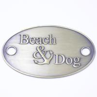 China Customized Zinc Alloy Nameplate Metal Oval Name Plate With Embossed Font Beach Logo for sale