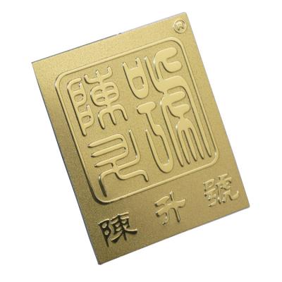 China Gold Metal Wine Label Corrosion Resistant Logo Metal Label For Gift Box Packaging for sale