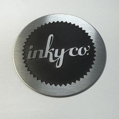 China Customized Circular Etched Stainless Steel Nameplate Filled With Black Paint for sale