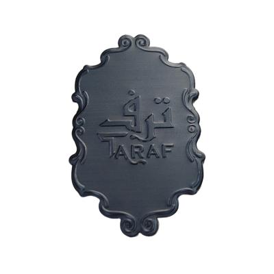 China Custom Black Aluminum Embossed Perfume Label With Self-Adhesive Backing for sale
